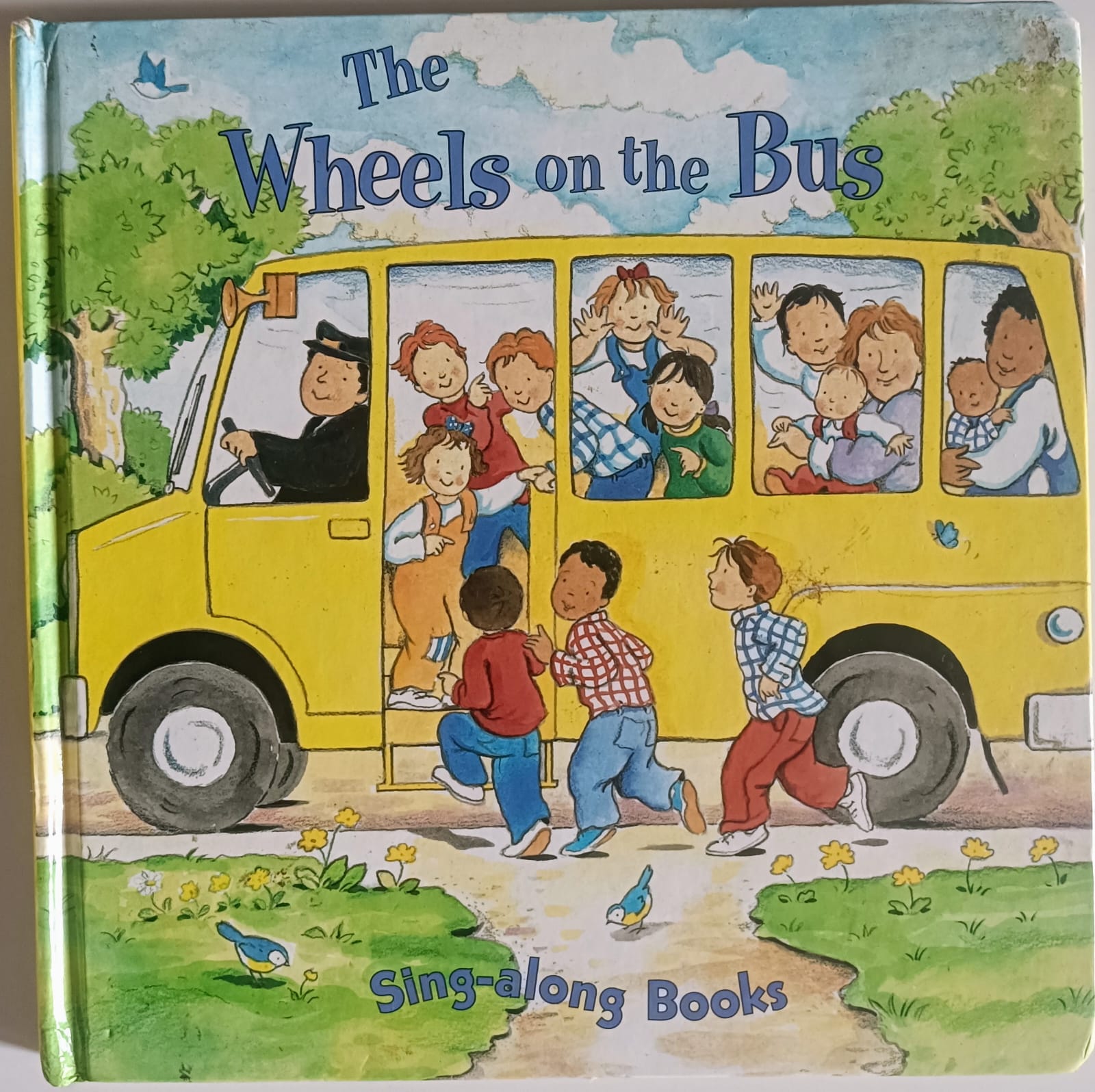 The wheels on the bus Sing- along books – thecuriousbrains